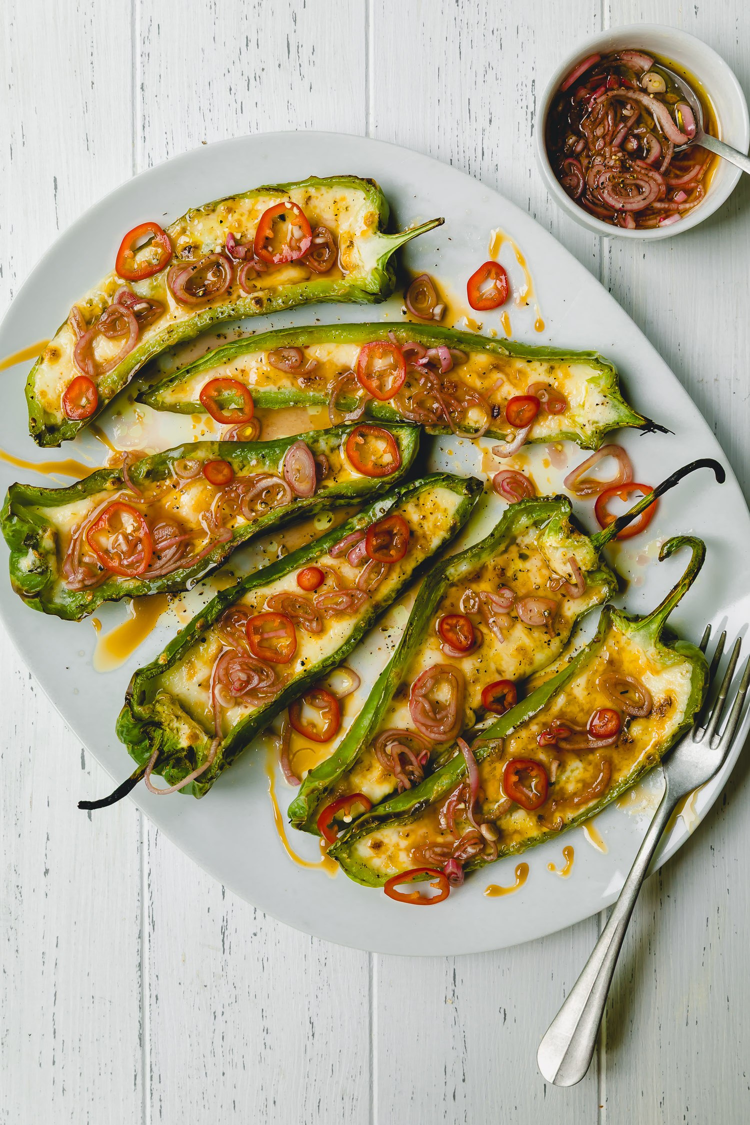 Blistered Cheesy Peppers with Chili-Shallot Vinaigrette and Hot Honey ...